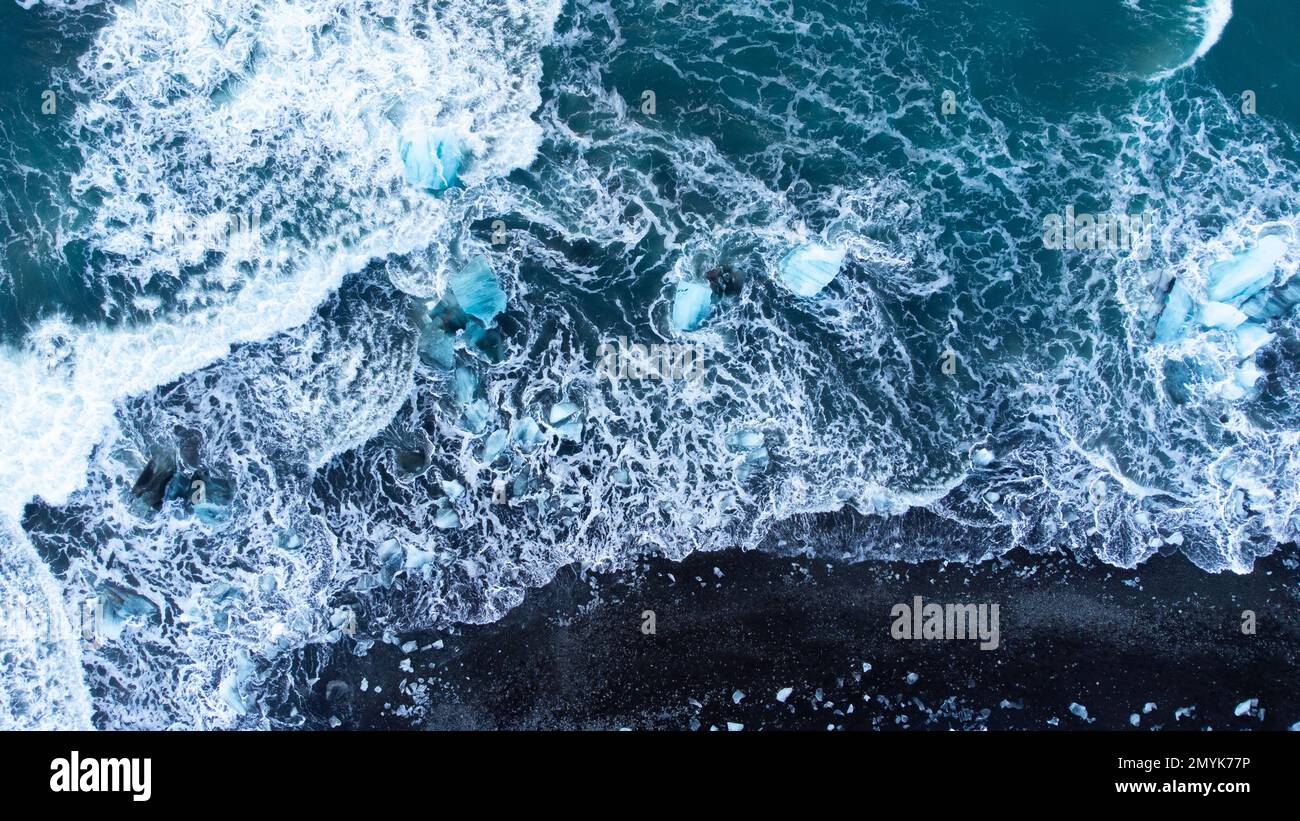 Melting Arctic Ice in Ocean Water, Blue Glacier Ice with Snow on Black ...