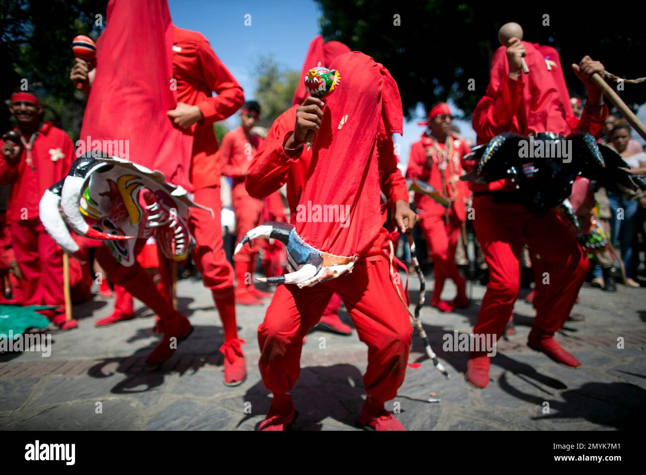 Dancing devils perform, shaking maracas during Corpus Christi ...
