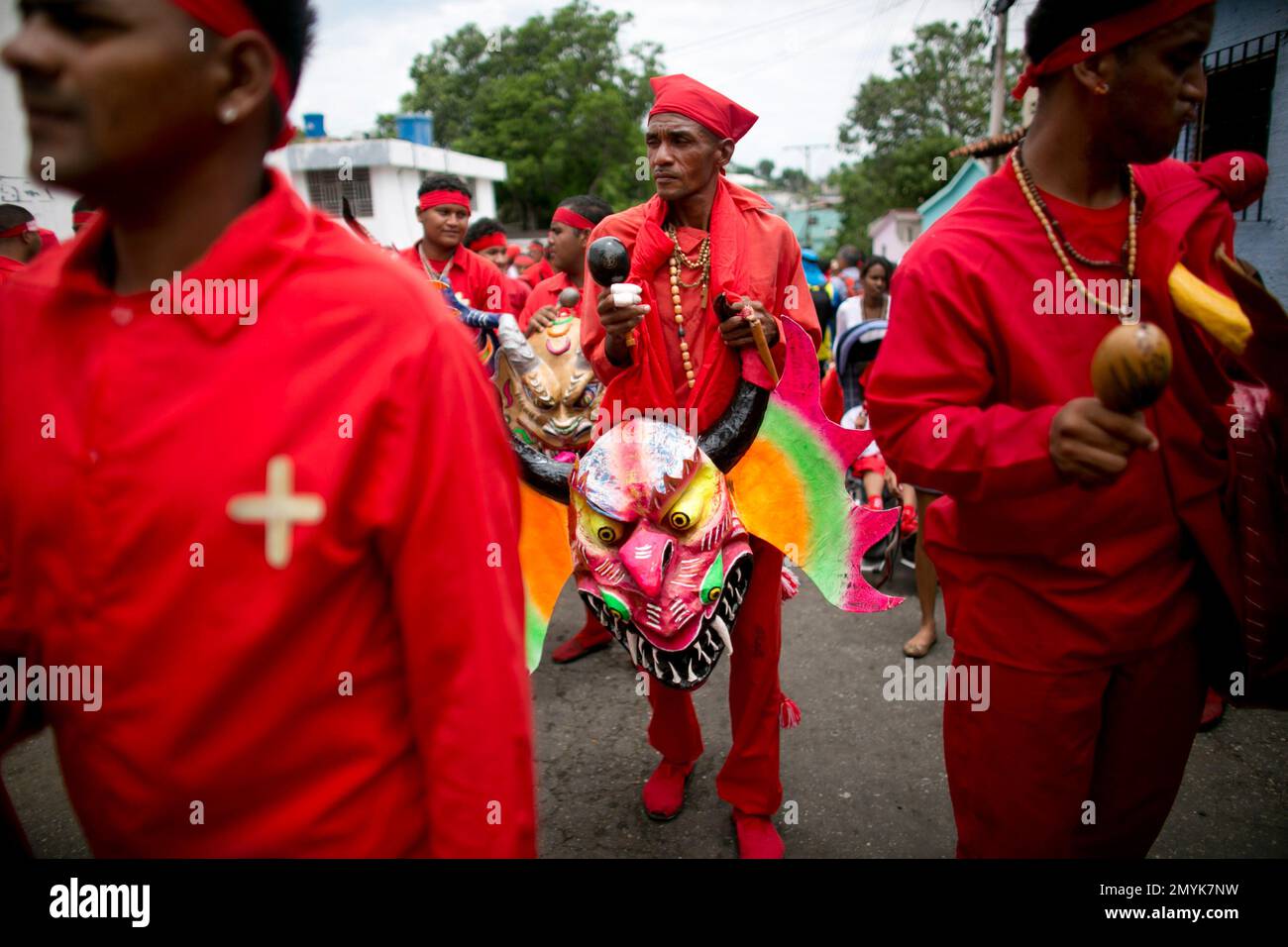 Dancing devils perform, shaking maracas during Corpus Christi ...