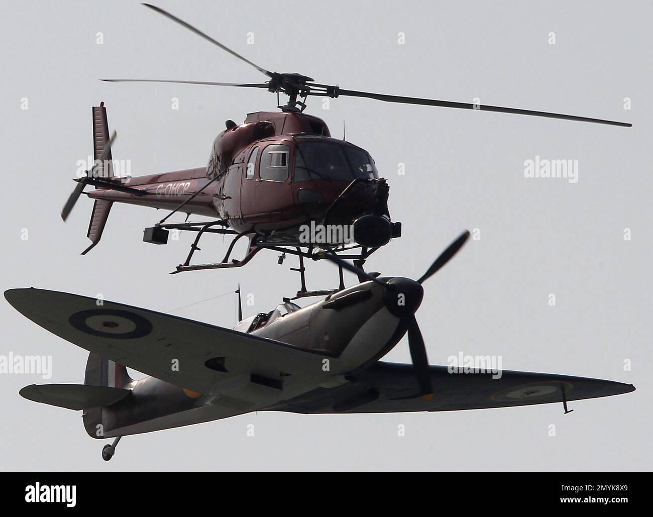 A fighter plane is filmed during a scene for the movie "Dunkirk," in ...