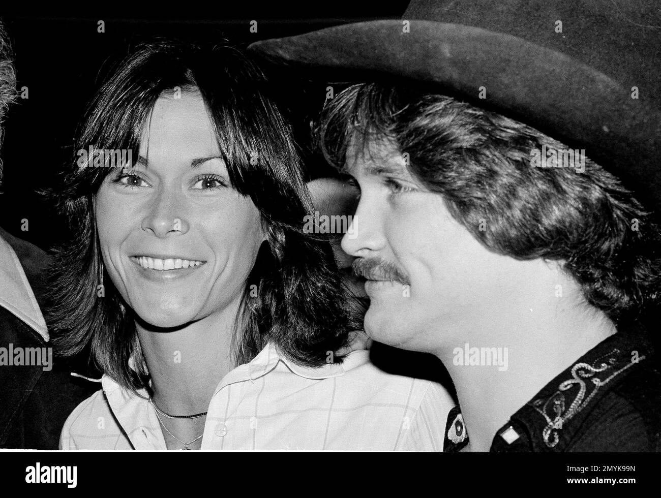 Actress Kate Jackson smiles, escorted by her husband Andrew Stevens ...