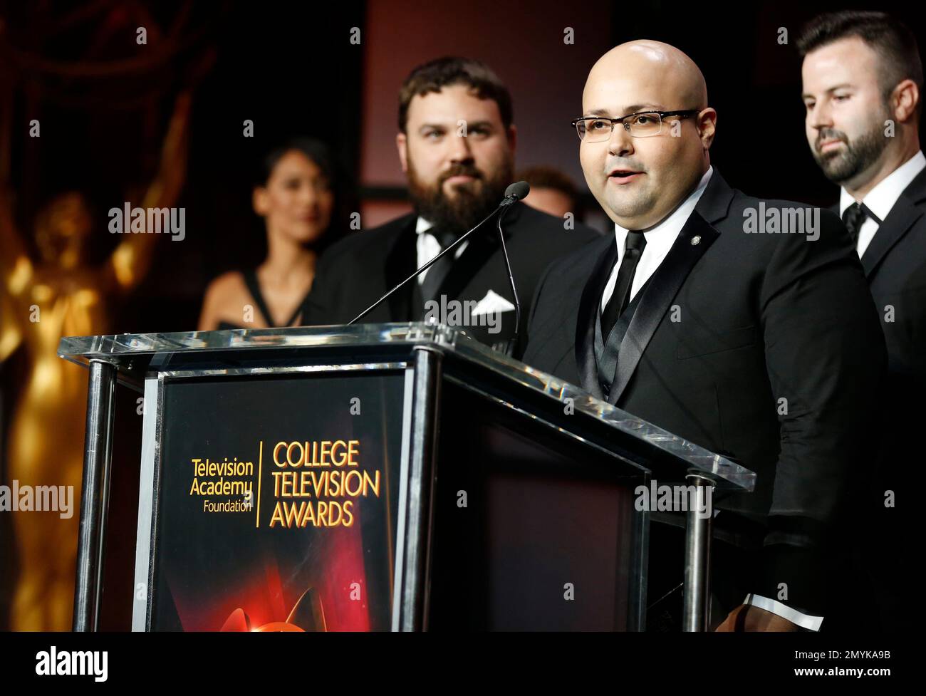 Jon Milano accepts the drama award for “Straw Dolls” at the 37th ...
