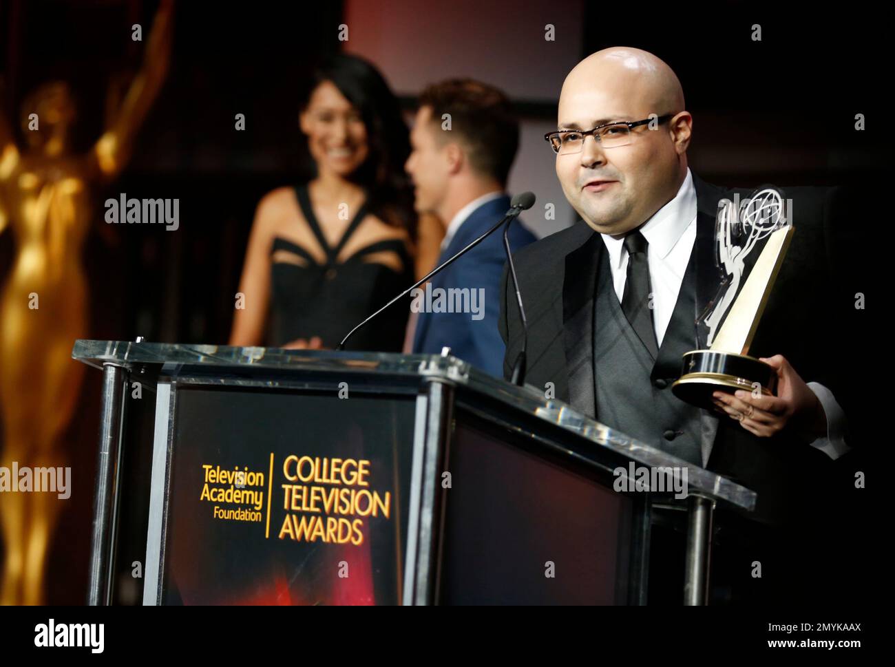 Jon Milano accepts the drama award for “Straw Dolls” at the 37th ...