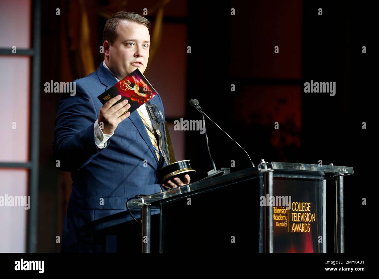 Ryan McManus of Pennsylvania State University accepts the newscast ...