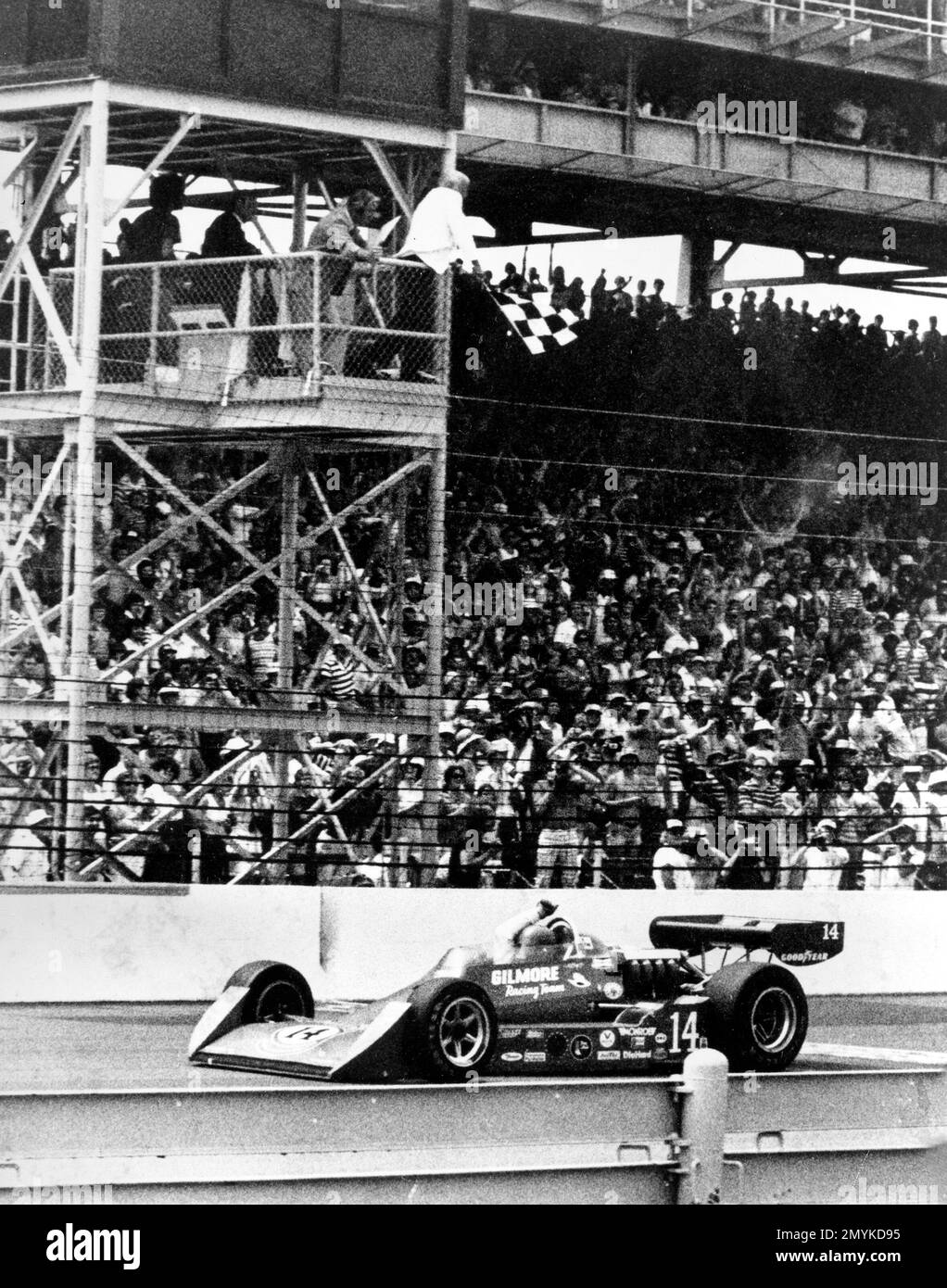FILE - In this May 29, 1977, file photo, A.J. Foyt raises his hand in ...