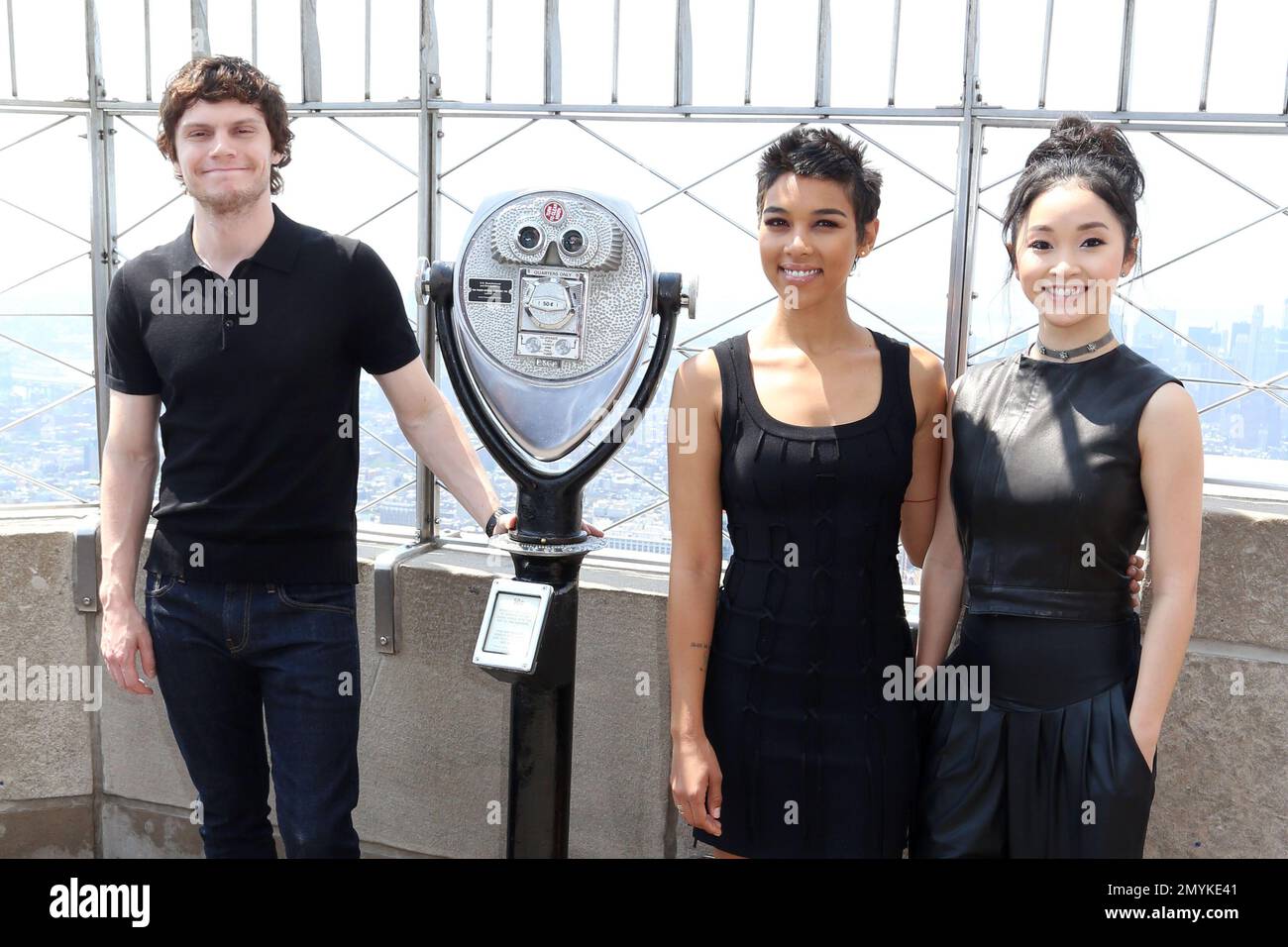 Evan Peters, from left, Alexandra Shipp, and Lana Condor visit the ...