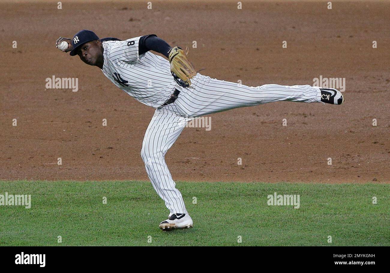 New York Yankees shortstop Didi Gregorius makes an off-balance throw to ...