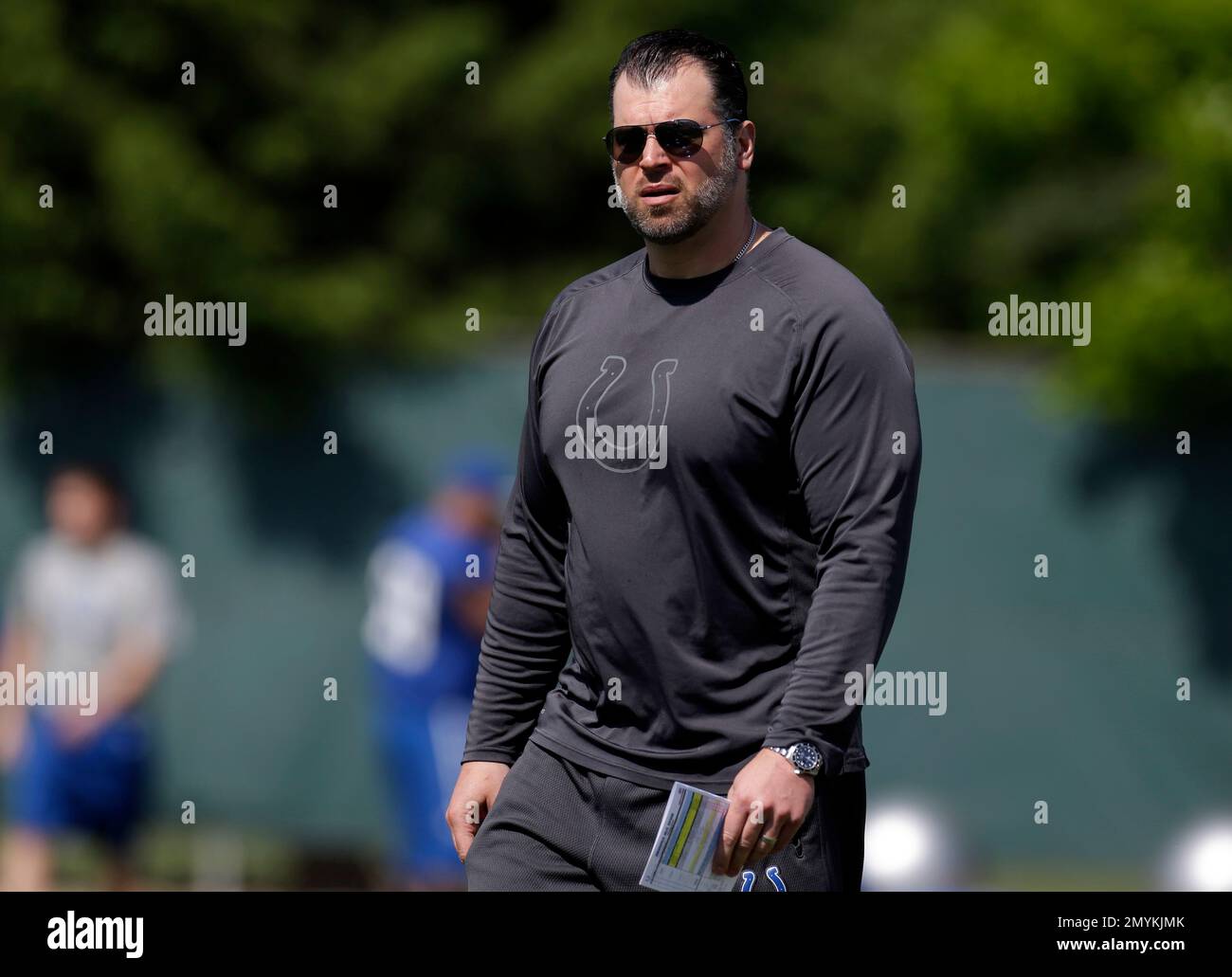 Indianapolis Colts general manager Ryan Grigson walks to the field ...
