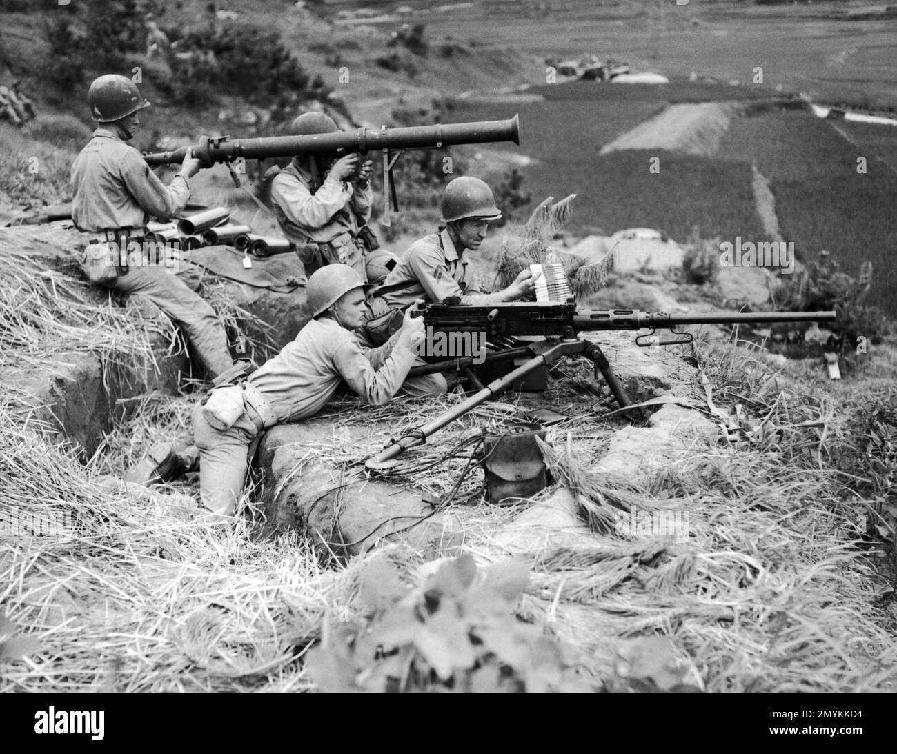 U.S Marine rocket launcher and machine gun crews prepare a hot welcome ...