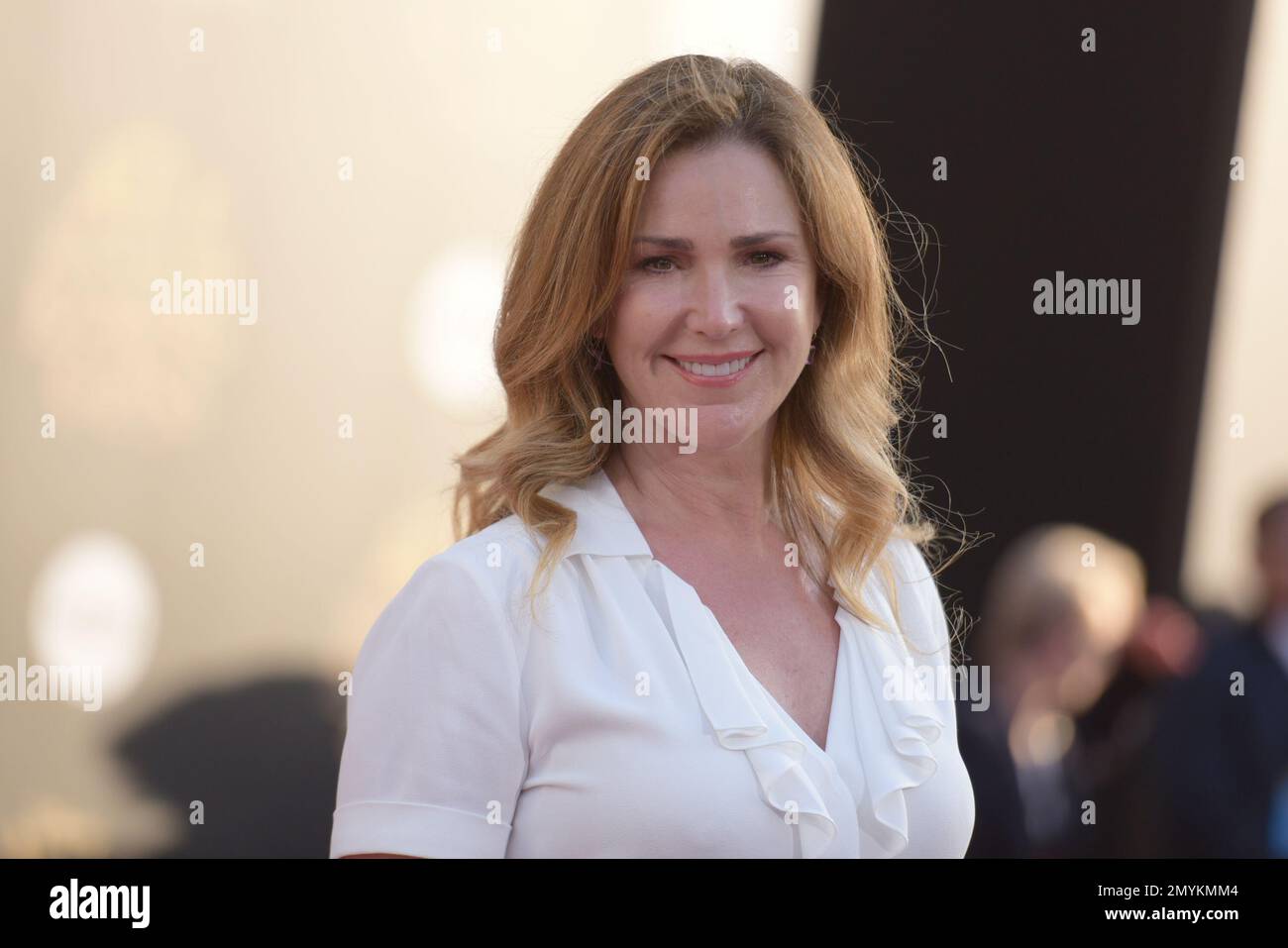 Peri Gilpin arrives at the premiere of "Alice Through the Looking Glass ...