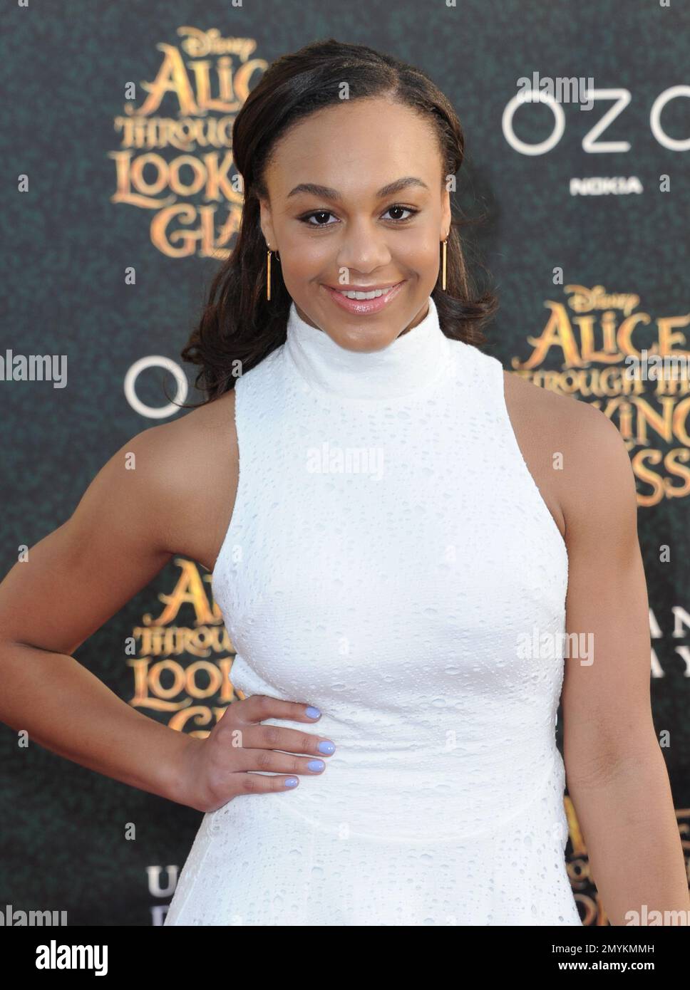 Nia Sioux arrives at the premiere of "Alice Through the Looking Glass ...