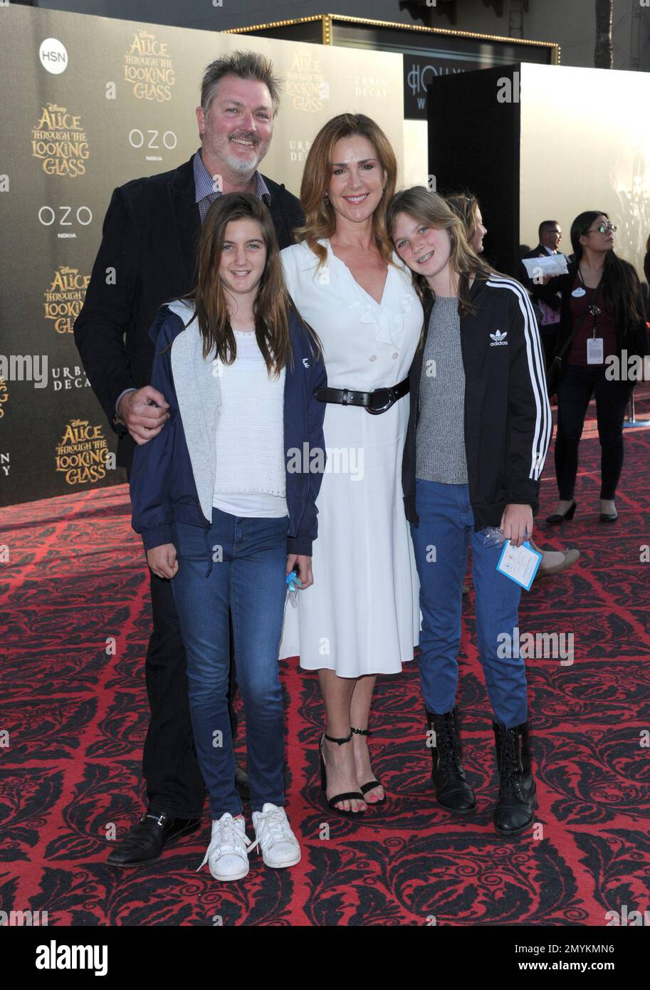 Christian Vincent, left, and Peri Gilpin arrive at the premiere of ...