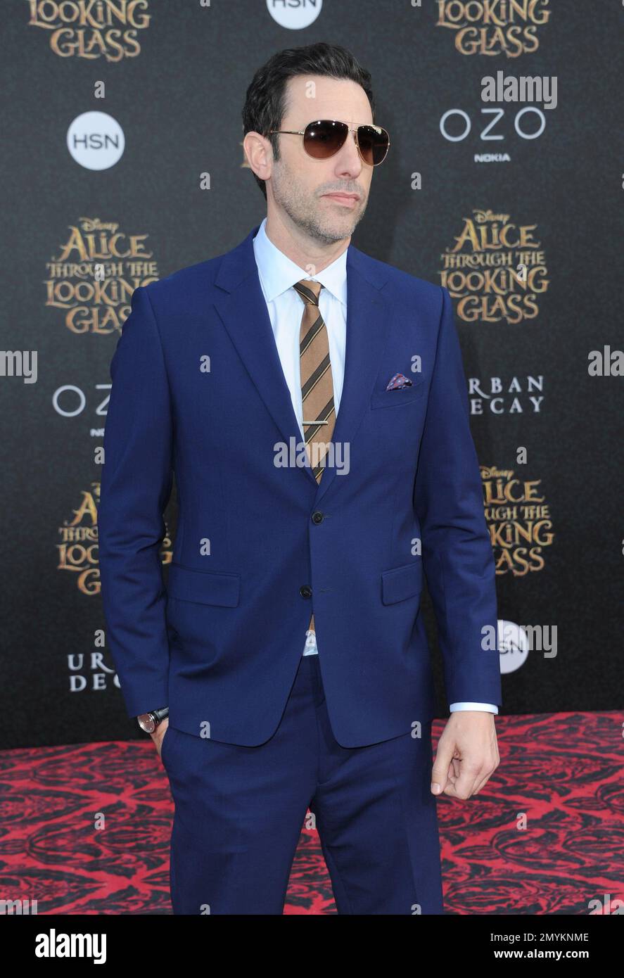 Sacha Baron Cohen arrives at the premiere of "Alice Through the Looking ...