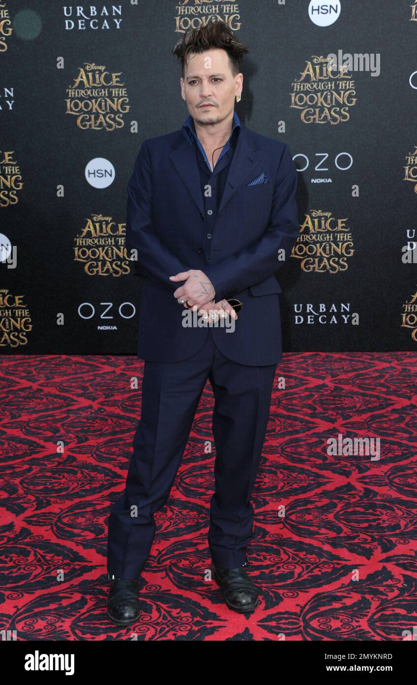 Johnny Depp arrives at the premiere of "Alice Through the Looking Glass ...