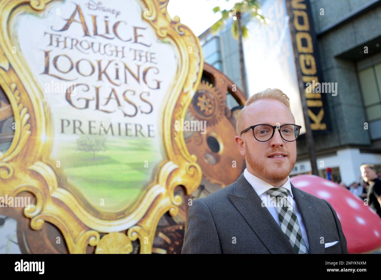 Owain Rhys Davies arrives at the premiere of "Alice Through the Looking ...