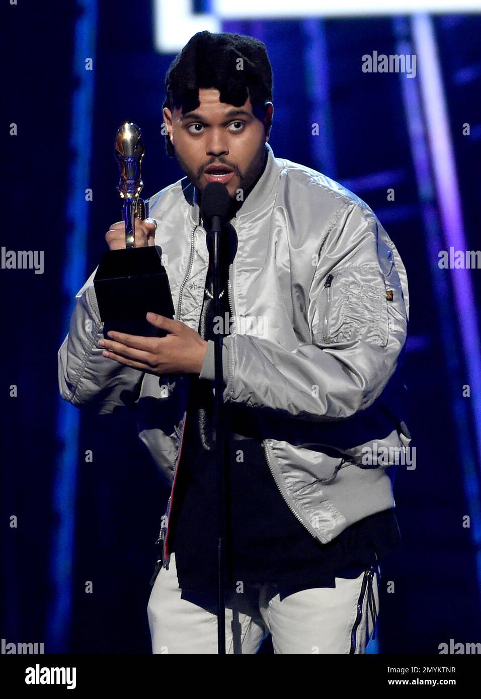 The Weeknd accepts the award for top R&B song for “The Hills” at the ...