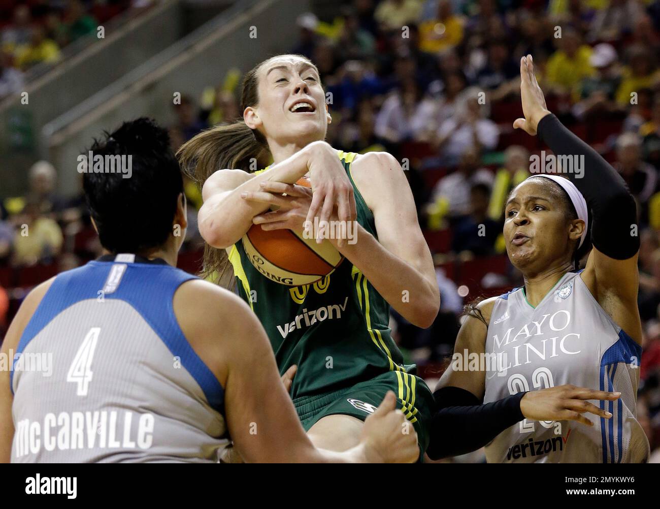 Seattle Storm's Breanna Stewart, center, tries to drive between ...