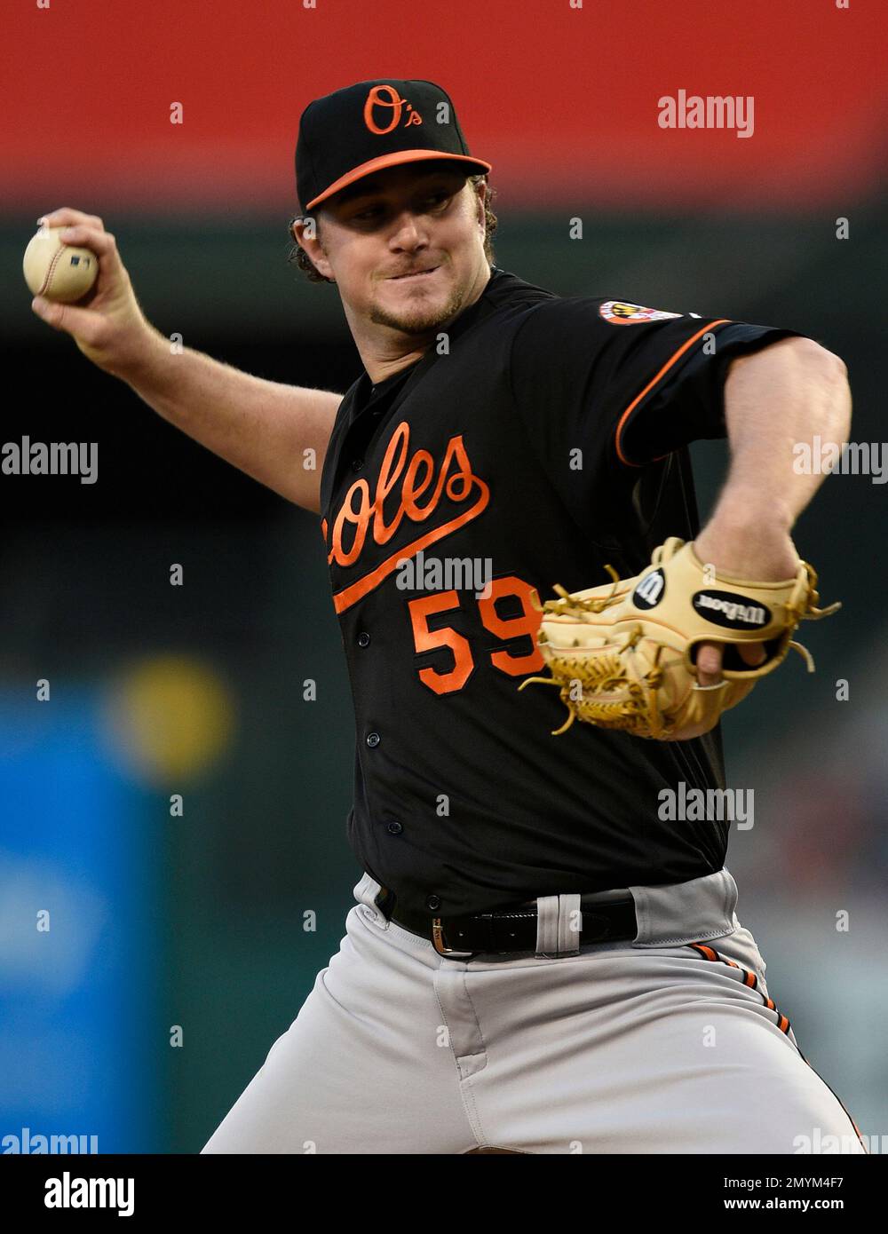 Baltimore Orioles starting pitcher Mike Wright pitches during the first inning of a baseball ...