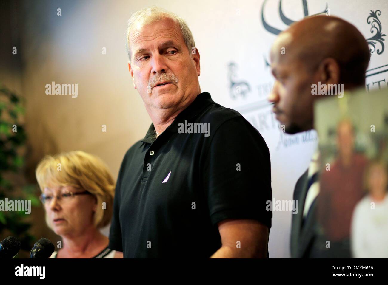 Kevin Sherman, center, speaks while standing next to his wife Mary Ann ...