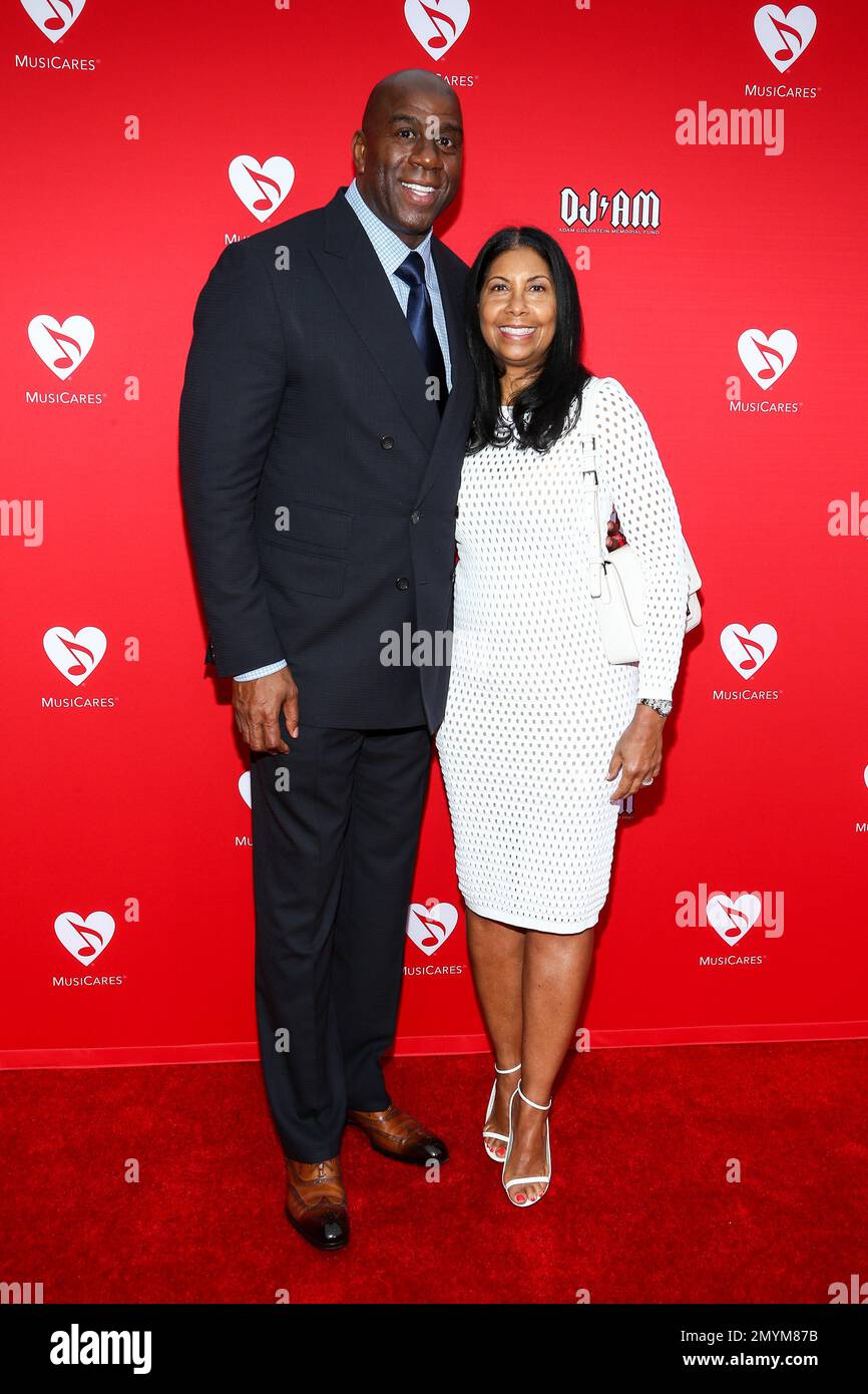 Ervin "Magic" Johnson, left, and Cookie Johnson attend the 12th Annual ...