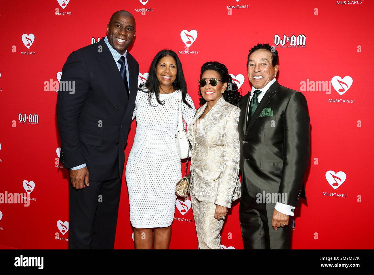 Ervin "Magic" Johnson, from left to right, Cookie Johnson, Frances ...