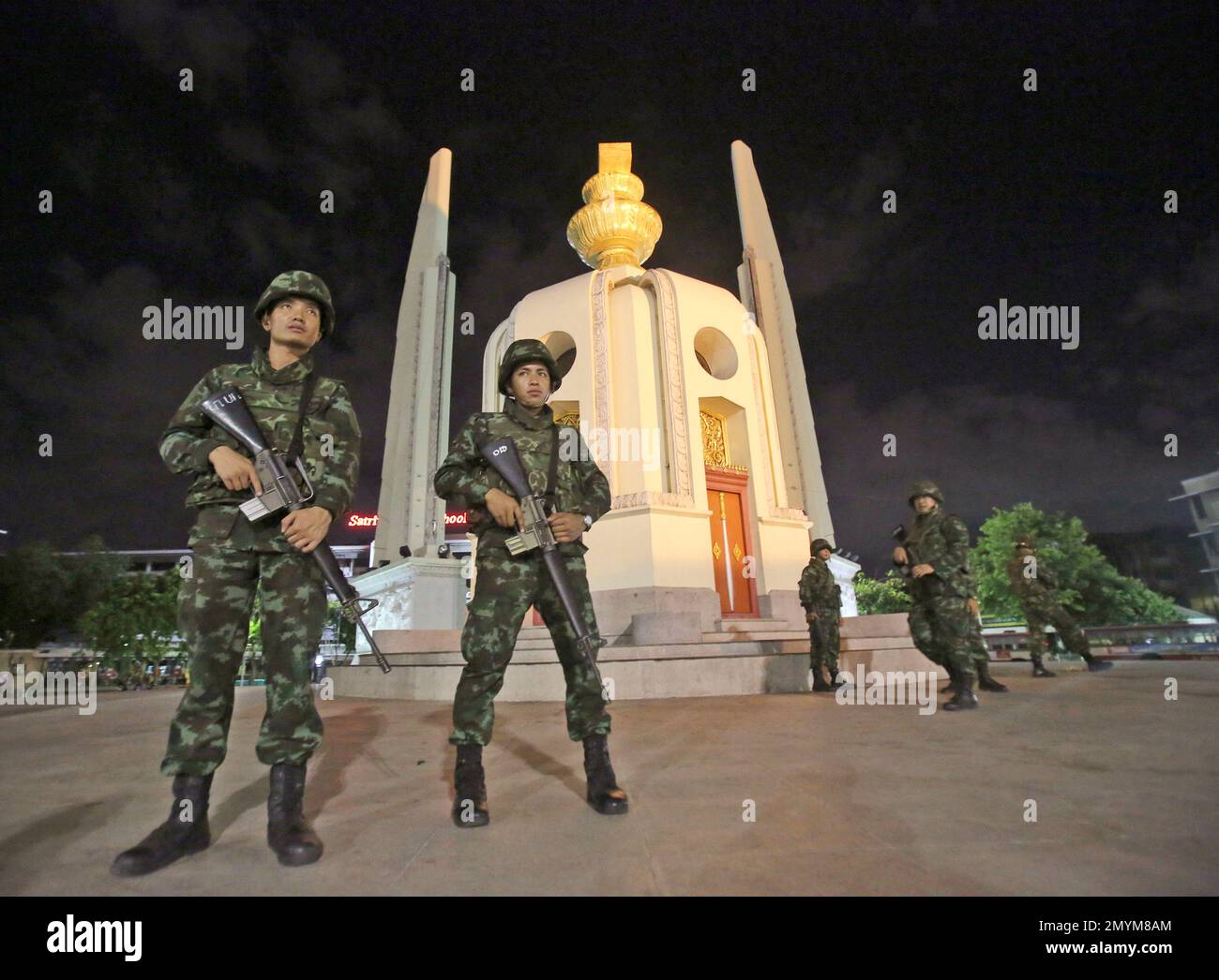 FILE - In this May 22, 2014, file photo, Thai soldiers stand guard in ...