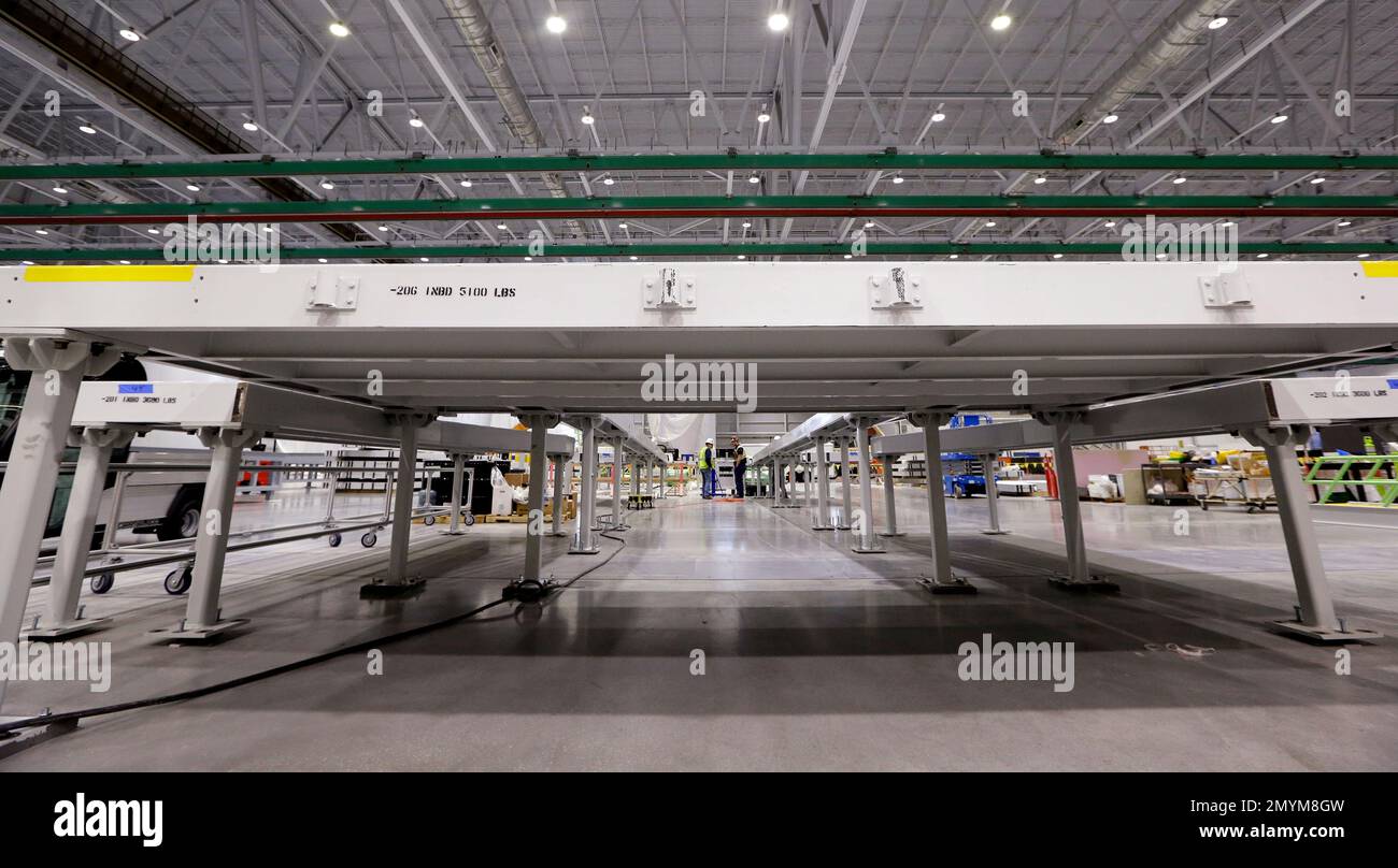 A support for a wing stands in a finish area of the new Boeing 777X ...