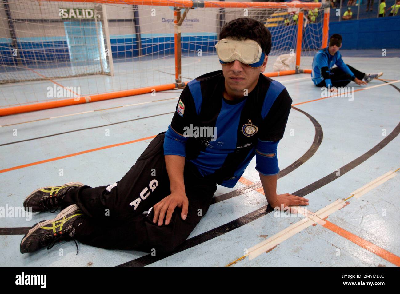 Players rest at half-time during the men's goalball match, a team sport ...
