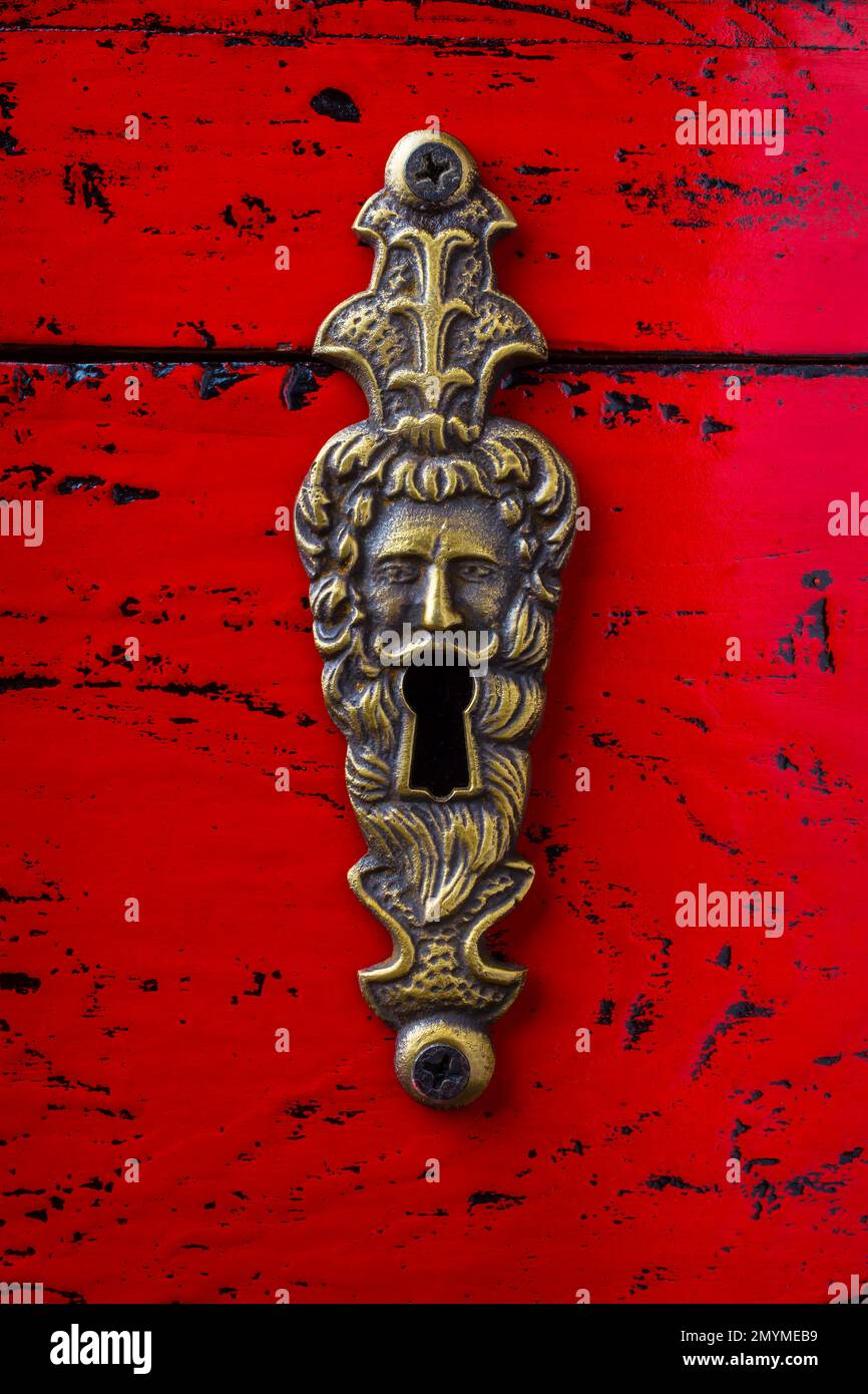 Antique Key Hole On Red Box Stock Photo - Alamy