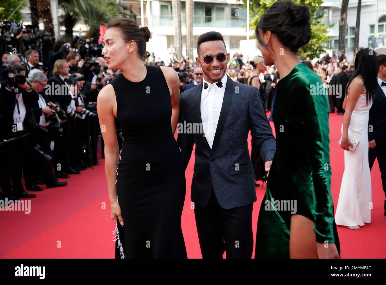 Model Adriana Lima, F1 driver Lewis Hamilton, and model Liya Kebede ...