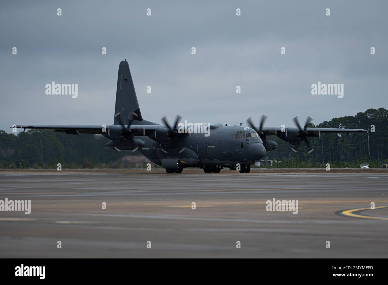 An MC-130J Commando II undergoes pre-flight operations at Hurlburt ...
