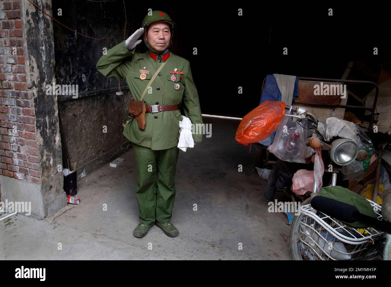 In this May 2, 2016 photo, Zhao Shunli salutes after completing the ...