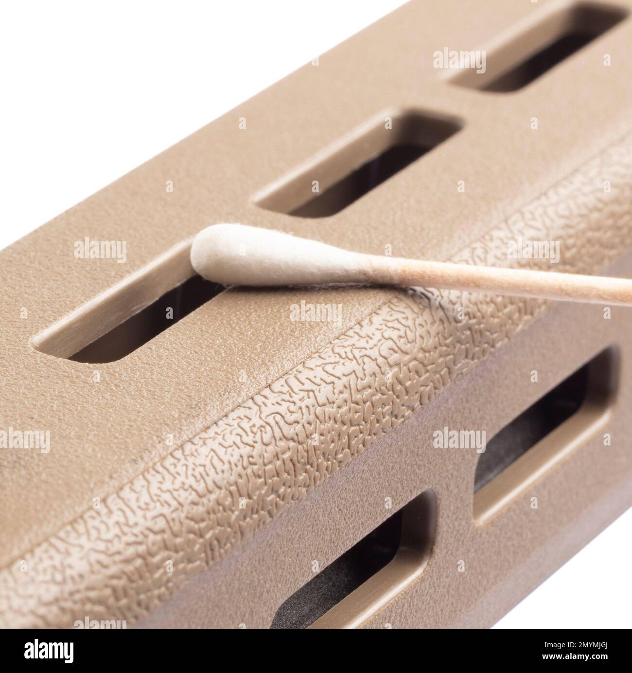 Clearning accessory mounting grooves on a rifle isolated on white Stock ...