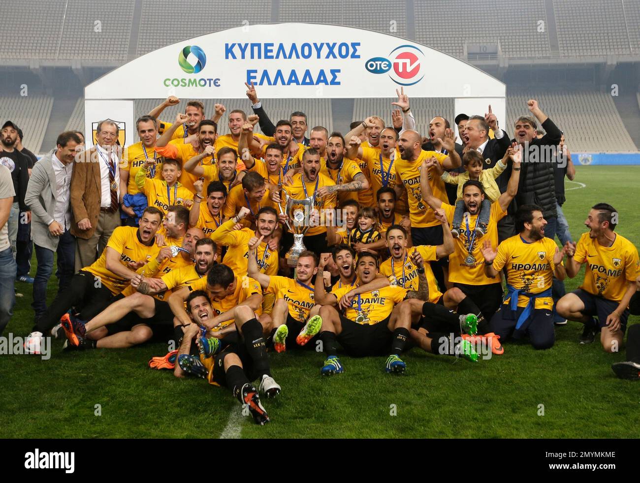 AEK Athens' players celebrate with the trophy after winning the Greek ...
