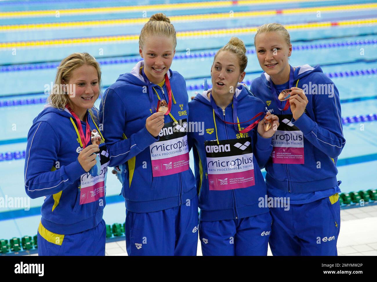 The Swedish team team celebrate after receiving their bronze medals for ...