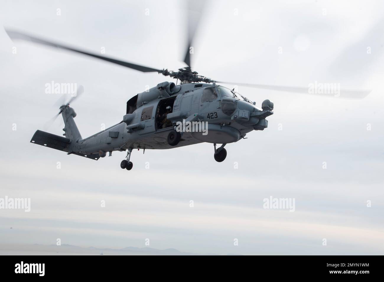 230203-N-XN177-1245 PACIFIC OCEAN (Feb. 3, 2023) – An MH-60R Sea Hawk ...