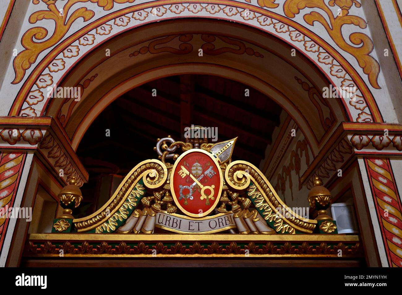 Coat of arms and motto of the Vatican in the mission church Catedral ...