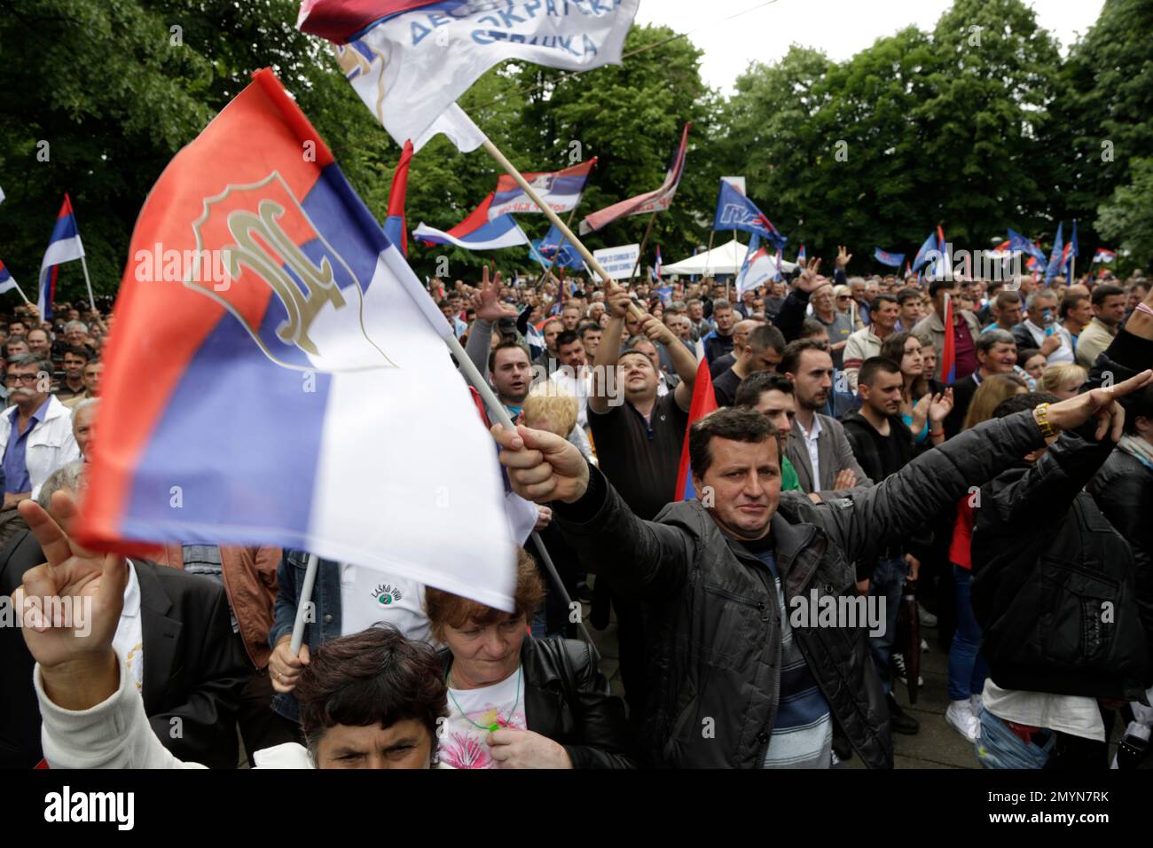 Bosnian Serb people wave flags during a demonstration in Banja Luka ...