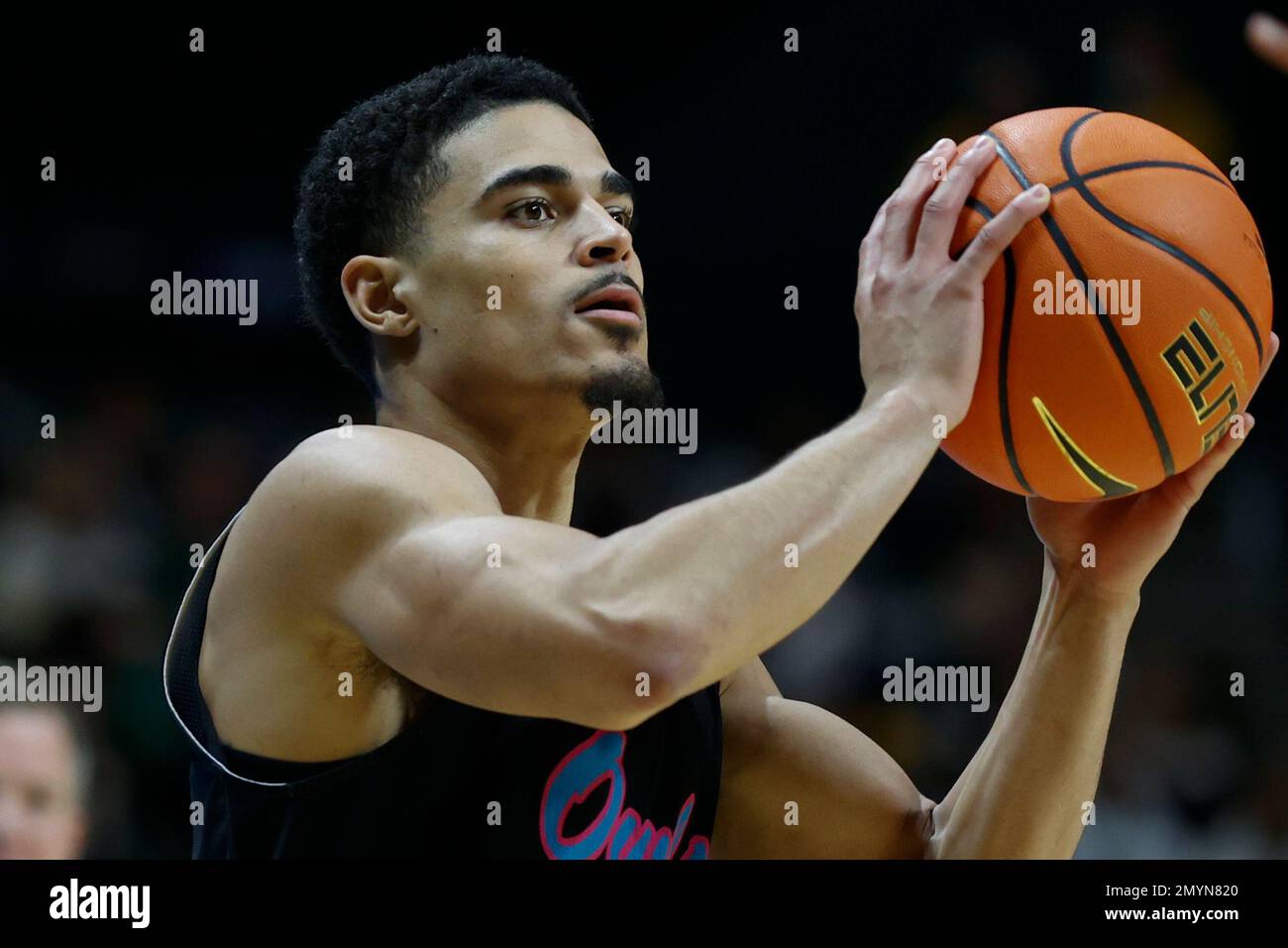 Florida Atlantic guard Bryan Greenlee looks to pass against Charlotte ...