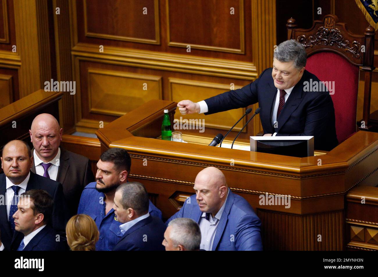Ukrainian President Petro Poroshenko, right, speaks while Ukraine's ...