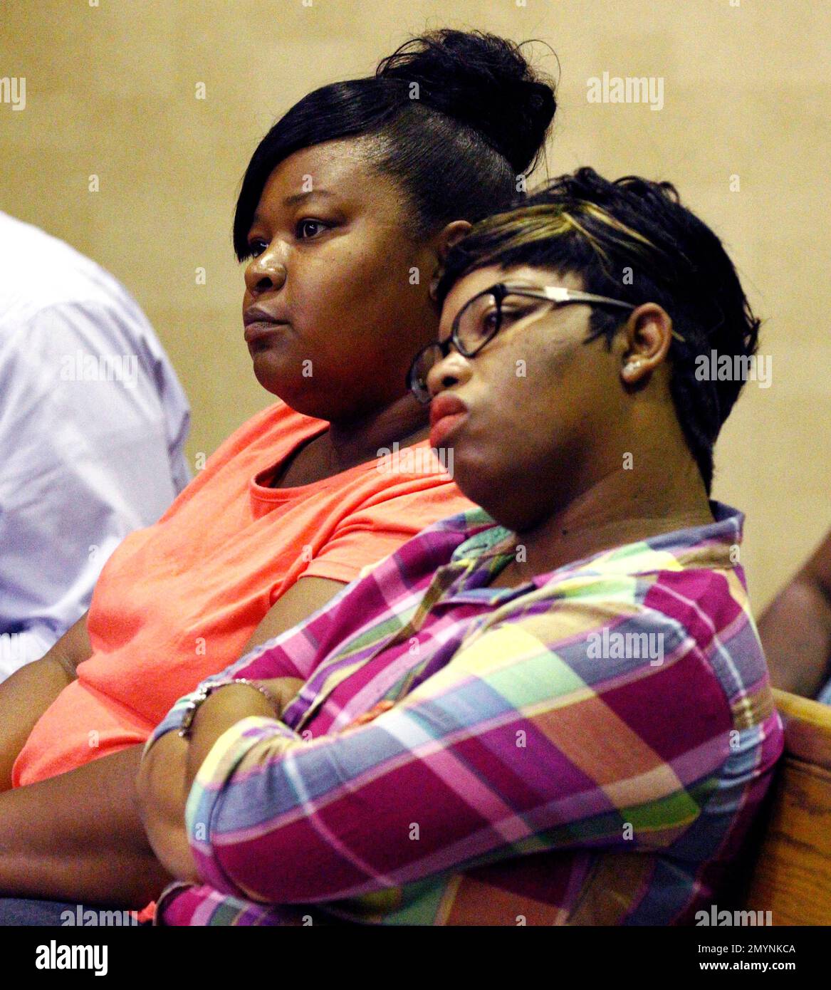 Half sisters Ashley Hill, right, and Kristy Hill, listen as Odell ...