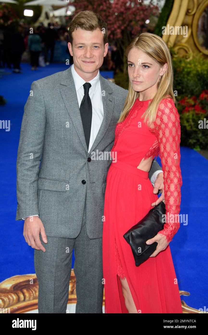 Ed Speleers and Asia Macey pose for photographers upon arrival at the ...