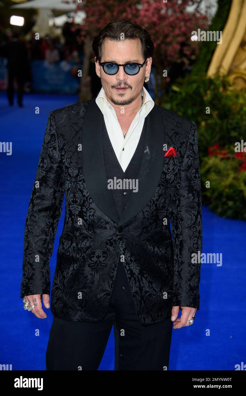 U.S actor, Johnny Depp poses for photographers upon arrival at the ...