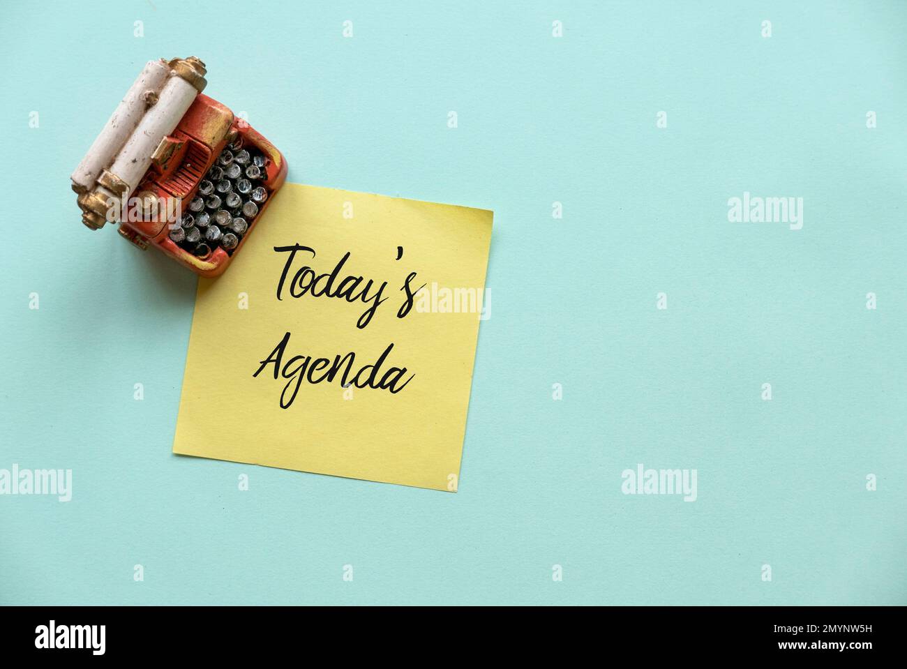 Copy space background with a yellow color empty sticky paper note ...