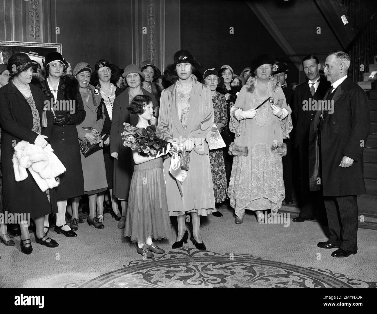 Alathea Fitzalan Howard presenting a bouquet of flowers to Princess ...