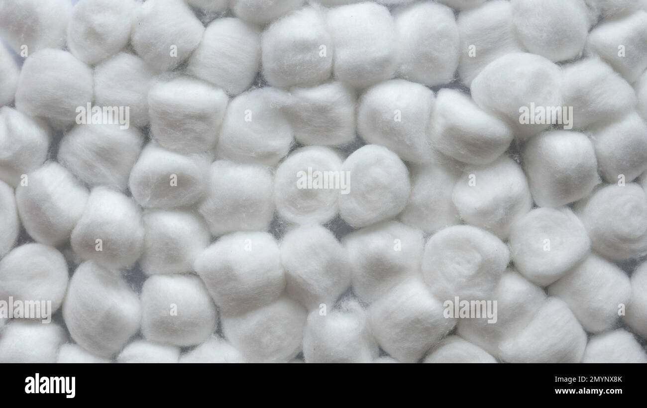 White cotton balls background and texture Stock Photo - Alamy