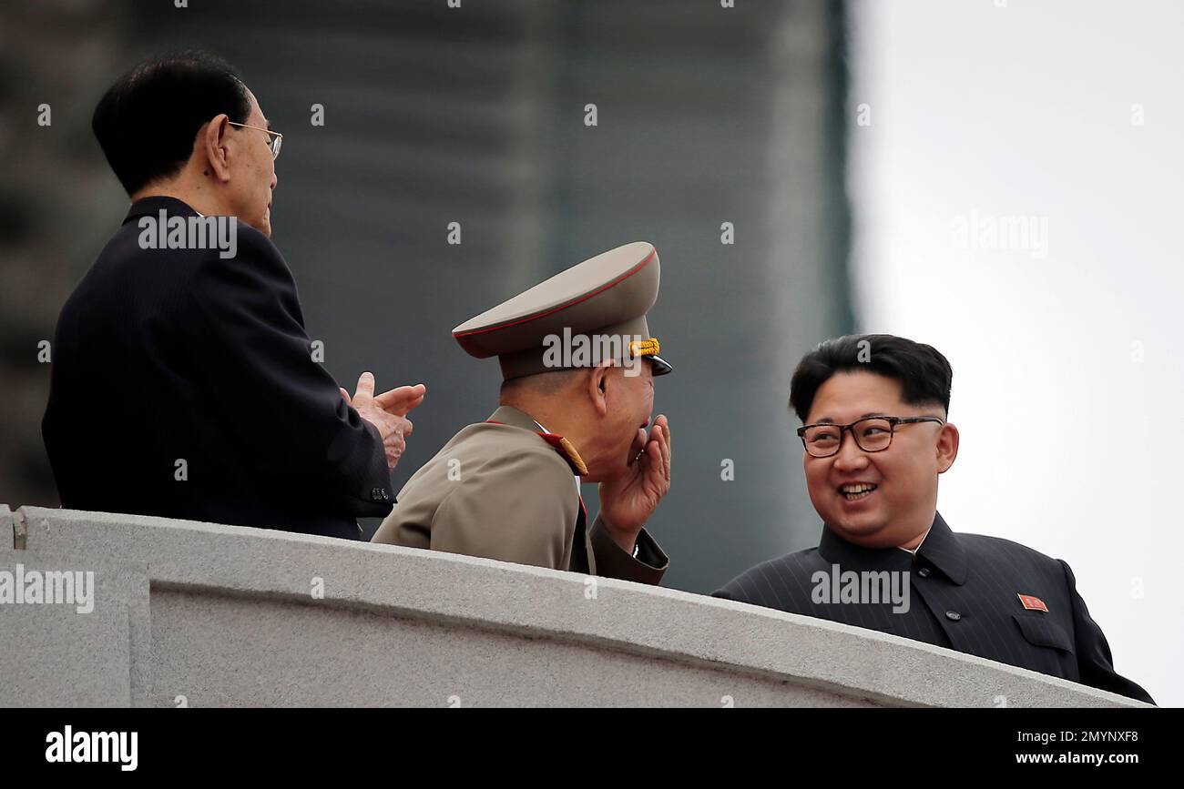 North Korean leader Kim Jong Un, right, smiles at Hwang Pyong So, the ...