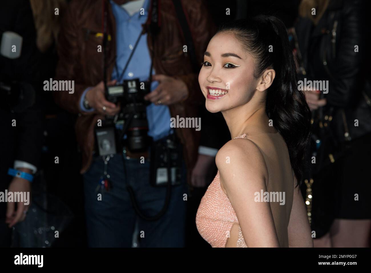 Actress Lana Condor poses for photographers upon arrival at the ...