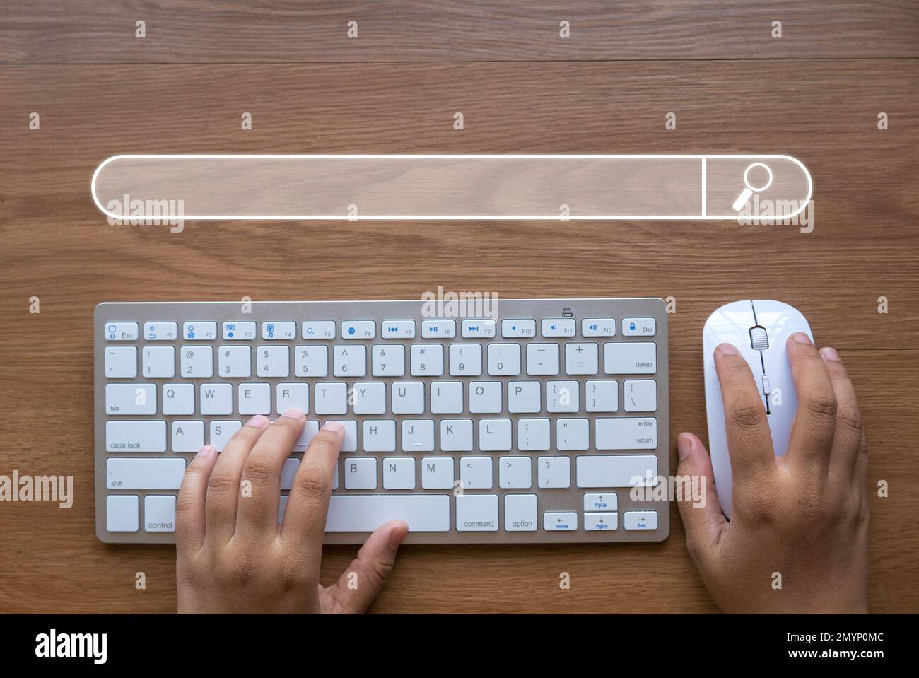 Hand holding computer mouse keyboard hi-res stock photography and ...