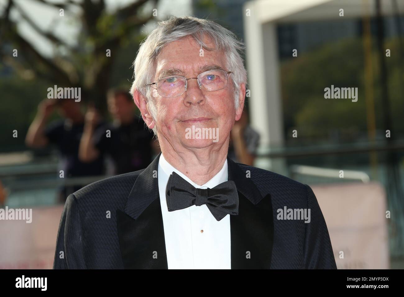 Tom Courtenay poses for photographers upon arrival at the British ...